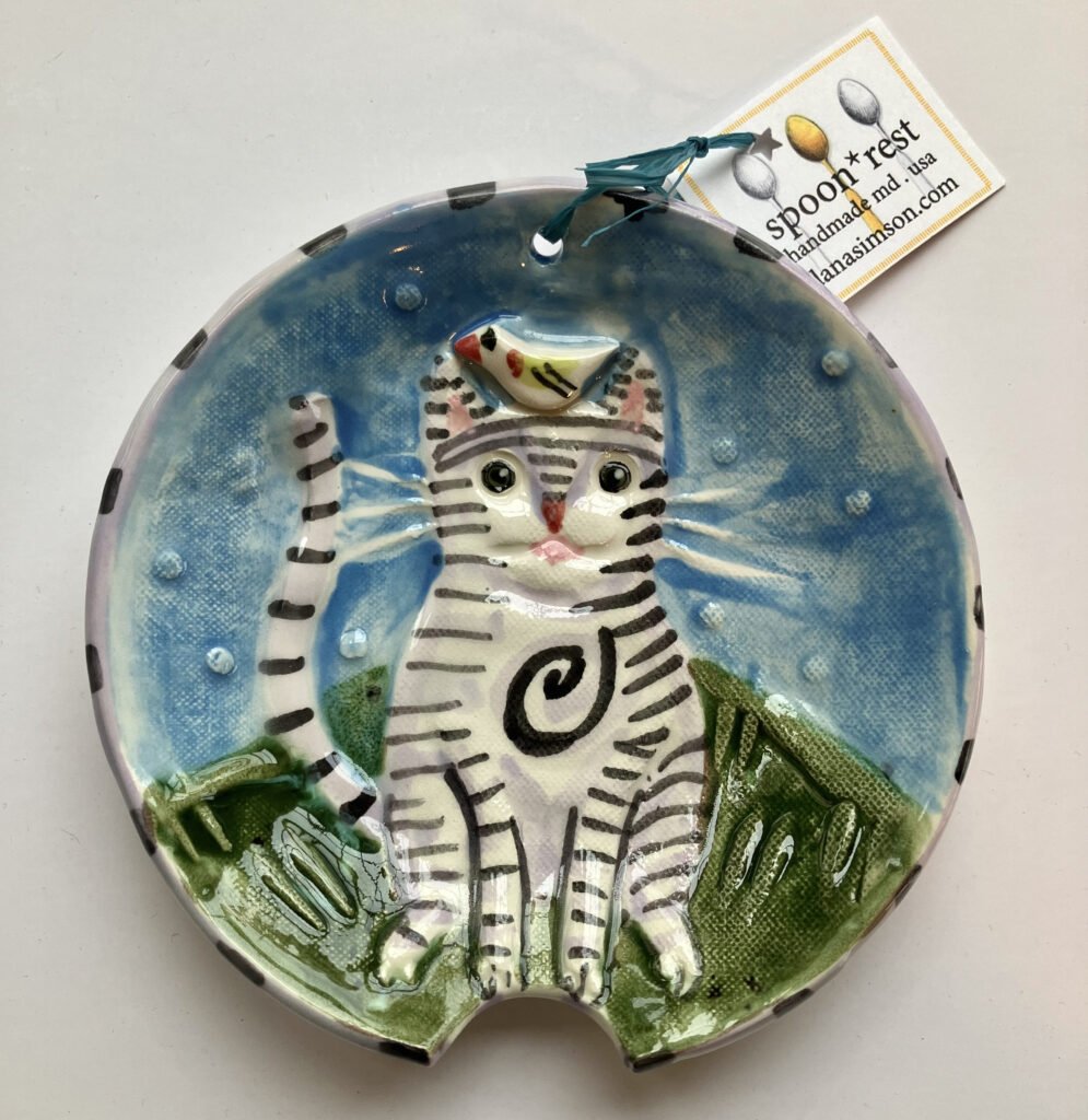 Our handmade ceramic striped cat spoon rest is fun functional art